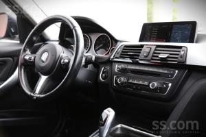 Black BMW 318 2014 in Riga, with an engine capacity of 2.00 L and mileage of 266 thousand km for 7495 €, photo 12 on AUTOMOTO.COM.LV