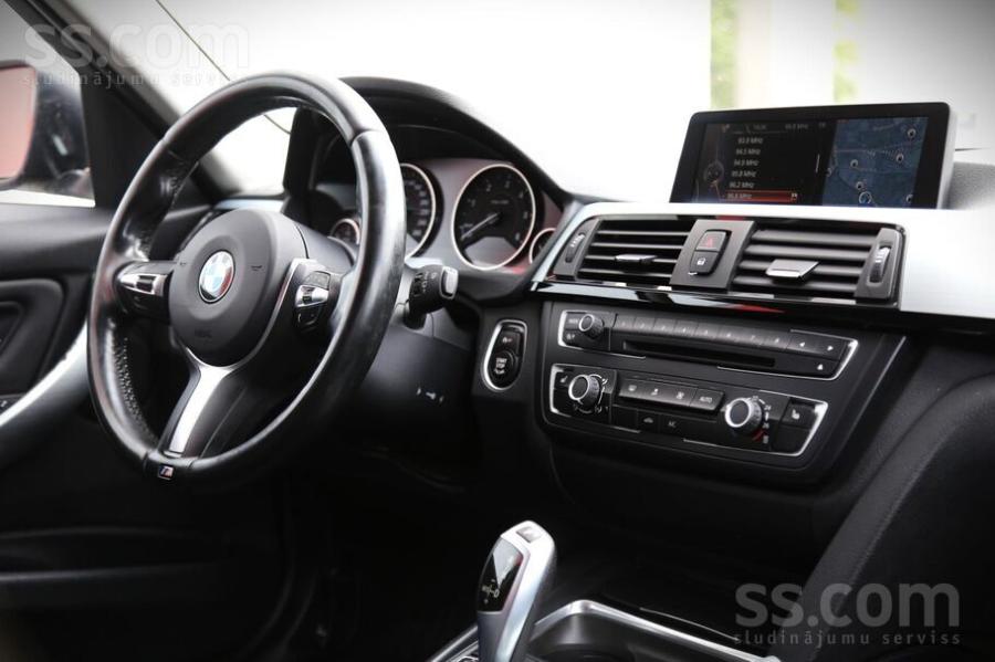 Black BMW 318 2014 in Riga, with an engine capacity of 2.00 L and mileage of 266 thousand km for 7495 €, photo 12 on AUTOMOTO.COM.LV