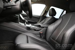 Black BMW 318 2014 in Riga, with an engine capacity of 2.00 L and mileage of 266 thousand km for 7495 €, photo 13 on AUTOMOTO.COM.LV