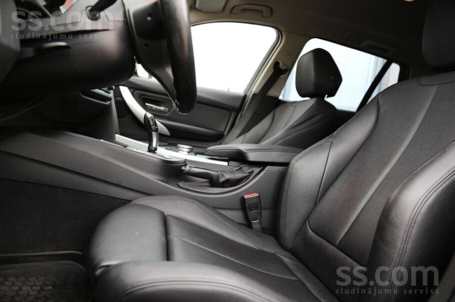 Black BMW 318 2014 in Riga, with an engine capacity of 2.00 L and mileage of 266 thousand km for 7495 €, photo 13 on AUTOMOTO.COM.LV