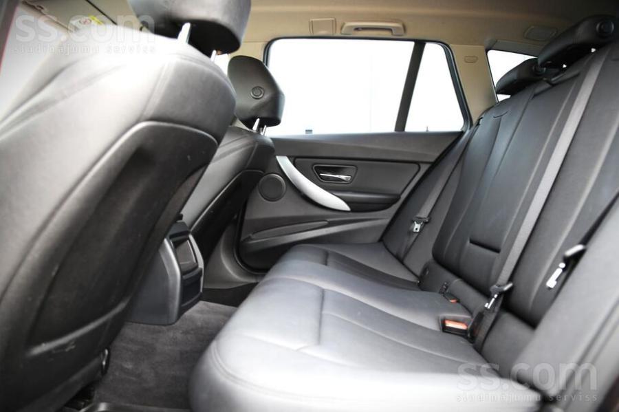 Black BMW 318 2014 in Riga, with an engine capacity of 2.00 L and mileage of 266 thousand km for 7495 €, photo 15 on AUTOMOTO.COM.LV