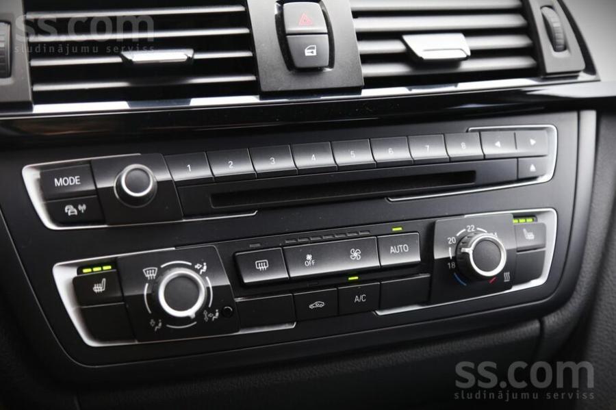 Black BMW 318 2014 in Riga, with an engine capacity of 2.00 L and mileage of 266 thousand km for 7495 €, photo 18 on AUTOMOTO.COM.LV