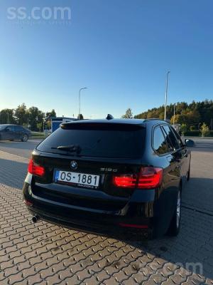 Black BMW 318 2014 in Riga, with an engine capacity of 2.00 L and mileage of 185 thousand km for 8300 €, photo 8 on AUTOMOTO.COM.LV
