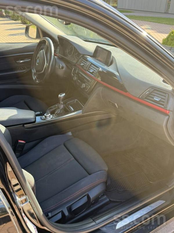 Black BMW 318 2014 in Riga, with an engine capacity of 2.00 L and mileage of 337 thousand km for 6800 €, photo 11 on AUTOMOTO.COM.LV