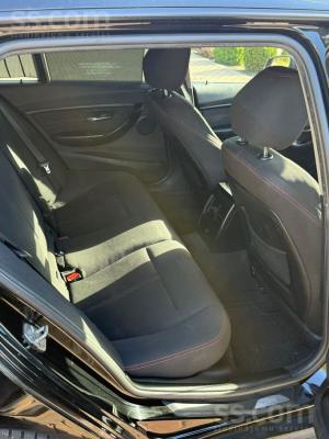 Black BMW 318 2014 in Riga, with an engine capacity of 2.00 L and mileage of 337 thousand km for 6800 €, photo 12 on AUTOMOTO.COM.LV