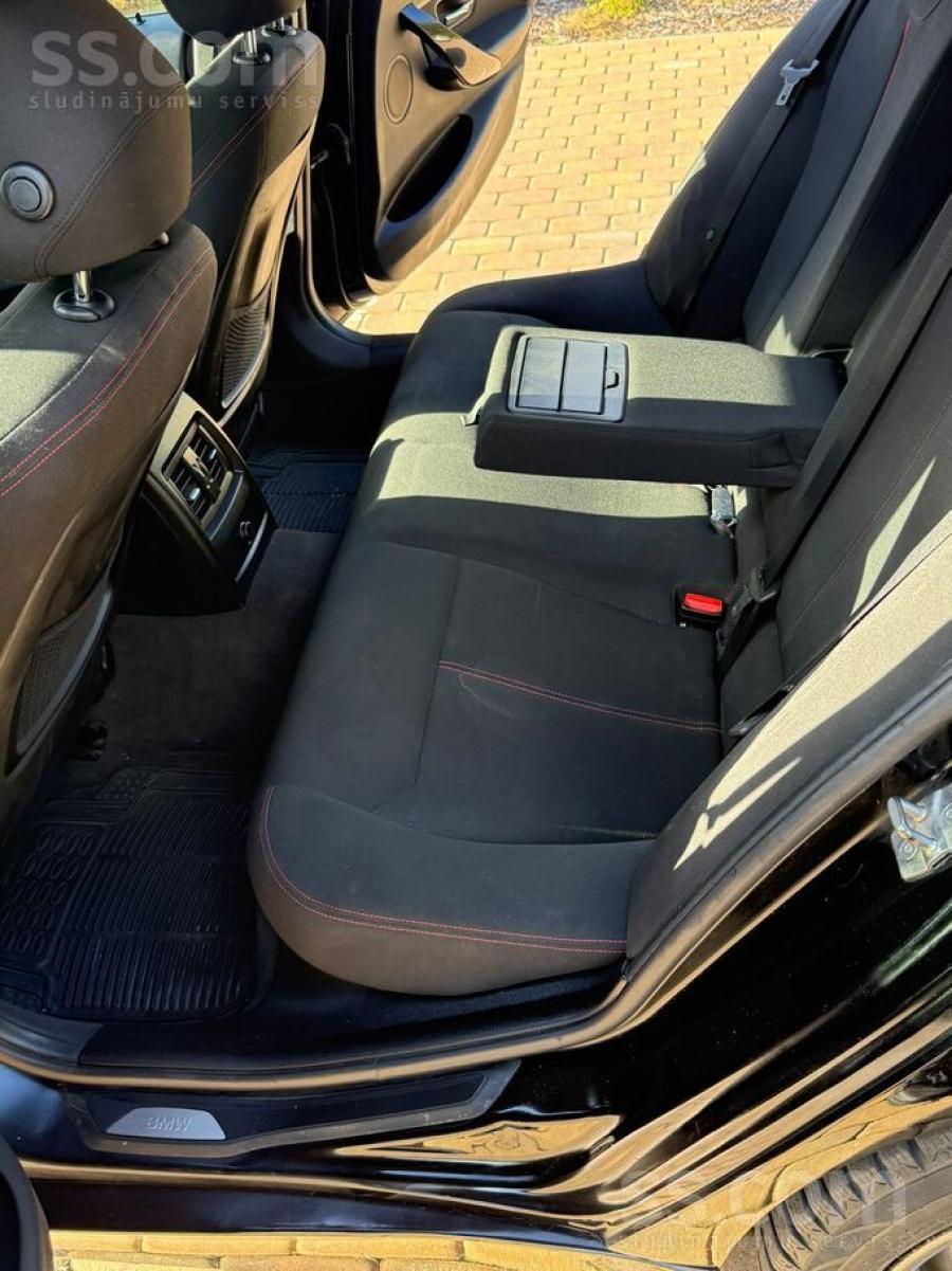 Black BMW 318 2014 in Riga, with an engine capacity of 2.00 L and mileage of 337 thousand km for 6800 €, photo 13 on AUTOMOTO.COM.LV
