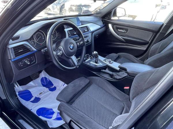 Black BMW 318 2015 in Taurage, with an engine capacity of 2.00 L and mileage of 228 thousand km for 9200 €, photo 10 on AUTOMOTO.COM.LV