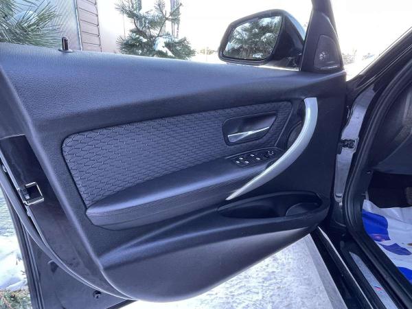Black BMW 318 2015 in Taurage, with an engine capacity of 2.00 L and mileage of 228 thousand km for 9200 €, photo 11 on AUTOMOTO.COM.LV