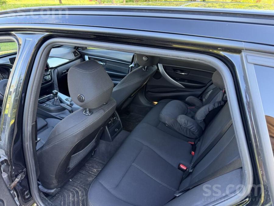 Black BMW 318 2015 in Riga, with an engine capacity of 2.00 L and mileage of 348 thousand km for 10690 €, photo 10 on AUTOMOTO.COM.LV