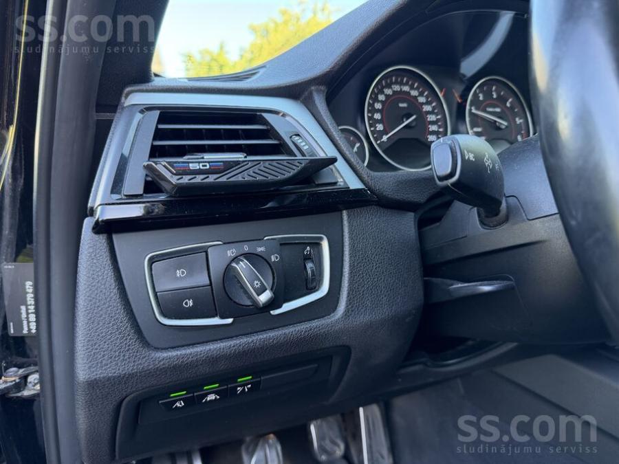 Black BMW 318 2015 in Riga, with an engine capacity of 2.00 L and mileage of 348 thousand km for 10690 €, photo 11 on AUTOMOTO.COM.LV
