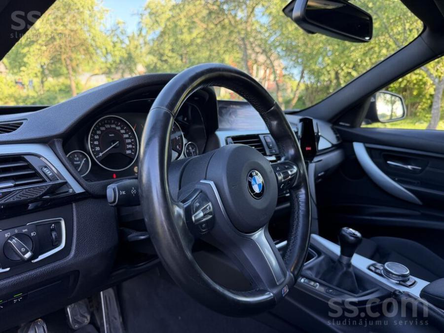 Black BMW 318 2015 in Riga, with an engine capacity of 2.00 L and mileage of 348 thousand km for 10690 €, photo 12 on AUTOMOTO.COM.LV