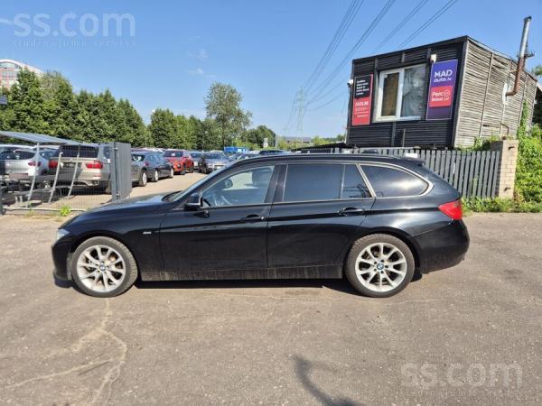Black BMW 318 2015 in Riga, with an engine capacity of 2.00 L and mileage of 349 thousand km for 7990 €, photo 9 on AUTOMOTO.COM.LV