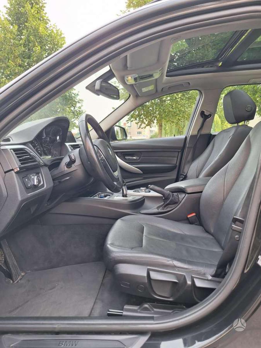 Black BMW 318 2015 in Vilnius, with an engine capacity of 2.00 L and mileage of 245 thousand km for 7800 €, photo 16 on AUTOMOTO.COM.LV