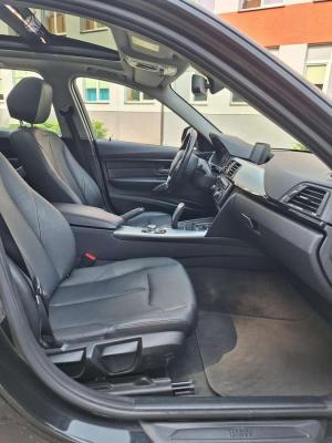 Black BMW 318 2015 in Vilnius, with an engine capacity of 2.00 L and mileage of 245 thousand km for 7800 €, photo 18 on AUTOMOTO.COM.LV