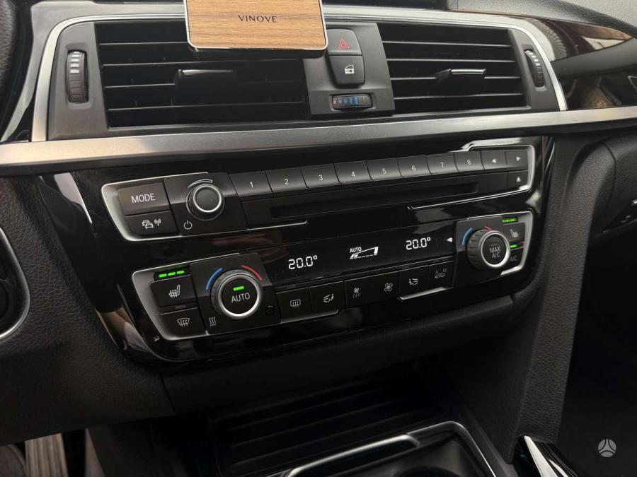 Black BMW 318 2015 in Vilnius, with an engine capacity of 2.00 L and mileage of 297 thousand km for 9900 €, photo 14 on AUTOMOTO.COM.LV