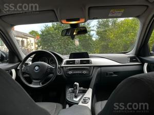 Black BMW 318 2015 in Riga, with an engine capacity of 2.00 L and mileage of 220 thousand km for 8250 €, photo 6 on AUTOMOTO.COM.LV