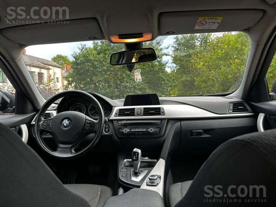 Black BMW 318 2015 in Riga, with an engine capacity of 2.00 L and mileage of 220 thousand km for 8250 €, photo 6 on AUTOMOTO.COM.LV