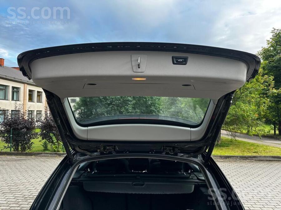 Black BMW 318 2015 in Riga, with an engine capacity of 2.00 L and mileage of 220 thousand km for 8250 €, photo 8 on AUTOMOTO.COM.LV