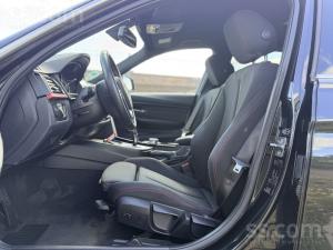 Black BMW 318 2015 in Riga, with an engine capacity of 2.00 L and mileage of 239 thousand km for 9995 €, photo 12 on AUTOMOTO.COM.LV