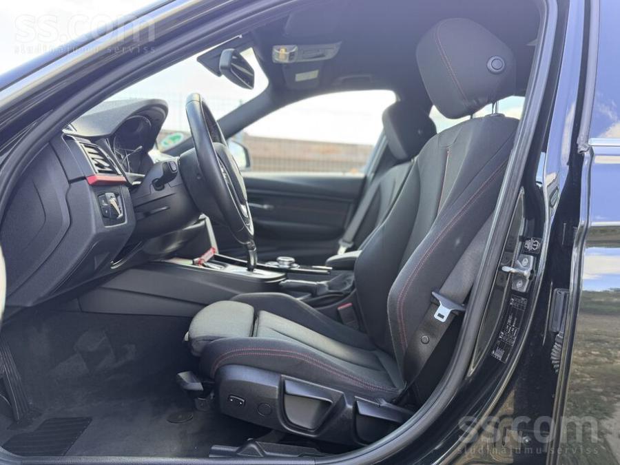 Black BMW 318 2015 in Riga, with an engine capacity of 2.00 L and mileage of 239 thousand km for 9995 €, photo 12 on AUTOMOTO.COM.LV