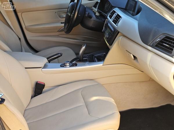 Black BMW 318 2015 in Ariogala, with an engine capacity of 2.00 L and mileage of 208 thousand km for 7500 €, photo 11 on AUTOMOTO.COM.LV