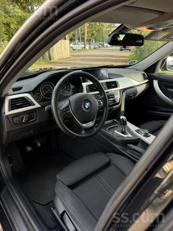 Black BMW 318 2016 in Riga, with an engine capacity of 2.00 L and mileage of 257 thousand km for 10400 €, photo 10 on AUTOMOTO.COM.LV