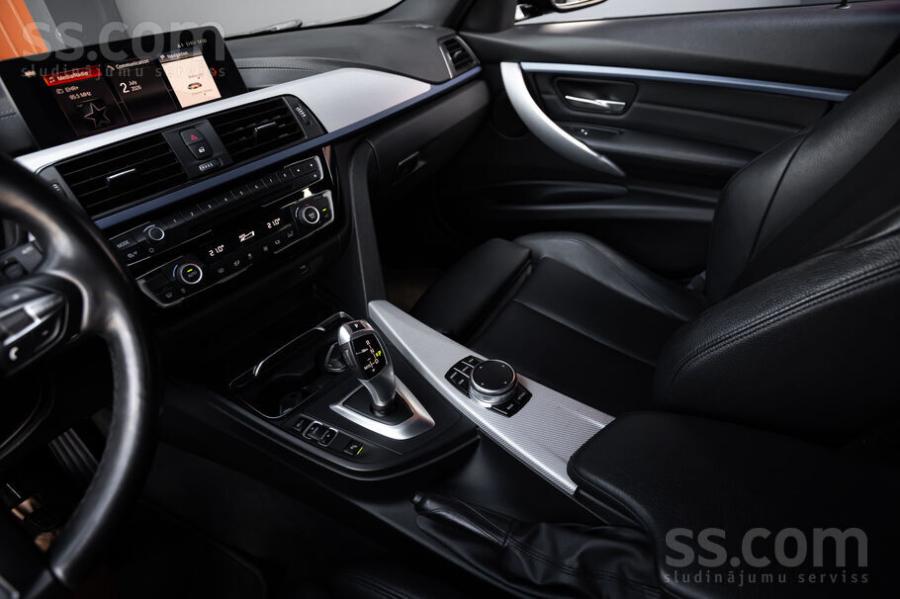 Black BMW 318 2017 in Jelgava, with an engine capacity of 2.00 L and mileage of 301 thousand km for 14800 €, photo 18 on AUTOMOTO.COM.LV