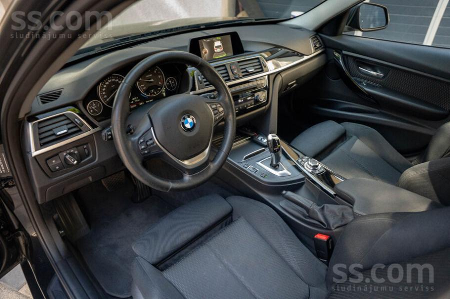 Black BMW 318 2017 in Riga, with an engine capacity of 2.00 L and mileage of 213 thousand km for 10990 €, photo 13 on AUTOMOTO.COM.LV