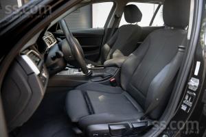Black BMW 318 2017 in Riga, with an engine capacity of 2.00 L and mileage of 213 thousand km for 10990 €, photo 16 on AUTOMOTO.COM.LV
