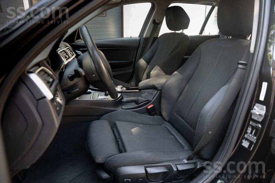Black BMW 318 2017 in Riga, with an engine capacity of 2.00 L and mileage of 213 thousand km for 10990 €, photo 16 on AUTOMOTO.COM.LV