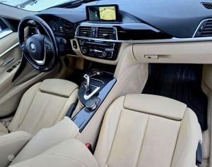 Black BMW 318 2018 in Taurage, with an engine capacity of 2.00 L and mileage of 231 thousand km for 9550 €, photo 21 on AUTOMOTO.COM.LV