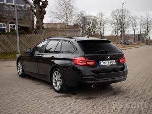 Black BMW 318 2018 in Liepaja, with an engine capacity of 2.00 L and mileage of 284 thousand km for 11000 €, photo 6 on AUTOMOTO.COM.LV