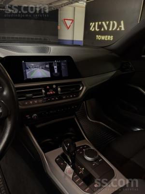 Black BMW 318 2021 in Riga, with an engine capacity of 2.00 L and mileage of 107 thousand km for 21500 €, photo 10 on AUTOMOTO.COM.LV