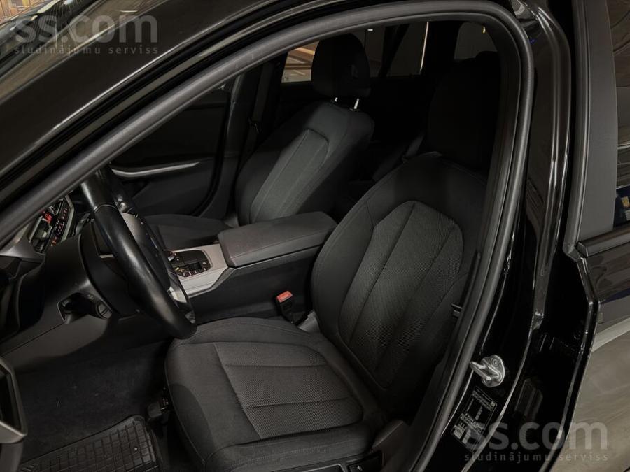 Black BMW 318 2021 in Riga, with an engine capacity of 2.00 L and mileage of 107 thousand km for 21500 €, photo 13 on AUTOMOTO.COM.LV