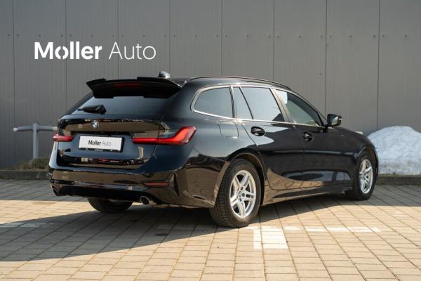 Black BMW 318 2021 in Vilnius, with an engine capacity of 2.00 L and mileage of 159 thousand km for 18550 €, photo 8 on AUTOMOTO.COM.LV