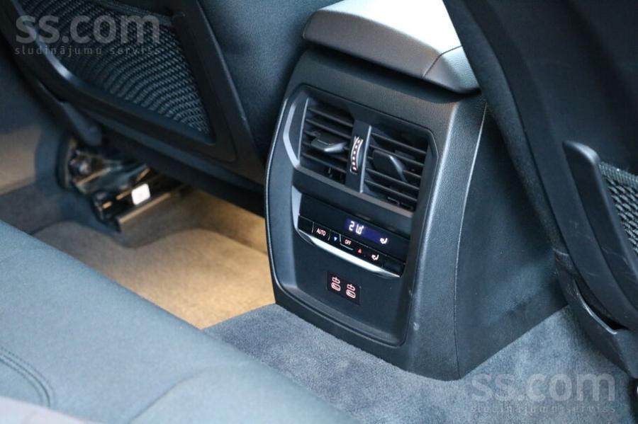 Black BMW 318 2021 in Riga, with an engine capacity of 2.00 L and mileage of 220 thousand km for 16990 €, photo 14 on AUTOMOTO.COM.LV