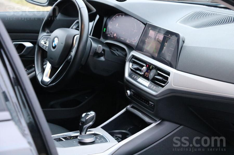 Black BMW 318 2021 in Riga, with an engine capacity of 2.00 L and mileage of 220 thousand km for 16990 €, photo 16 on AUTOMOTO.COM.LV
