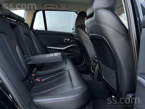 Black BMW 318 2021 in Riga, with an engine capacity of 2.00 L and mileage of 162 thousand km for 17990 €, photo 7 on AUTOMOTO.COM.LV