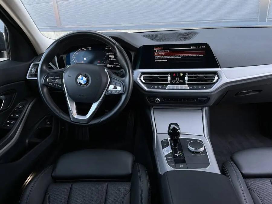 Black BMW 318 2021 in Riga, with an engine capacity of 2.00 L and mileage of 162 thousand km for 17990 €, photo 6 on AUTOMOTO.COM.LV