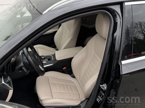 Black BMW 318 2021 in Jelgava, with an engine capacity of 2.00 L and mileage of 227 thousand km for 18500 €, photo 7 on AUTOMOTO.COM.LV