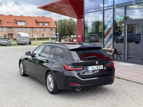 Black BMW 318 2024 in Klaipeda, with an engine capacity of 2.00 L and mileage of 100 thousand km for 21800 €, photo 6 on AUTOMOTO.COM.LV