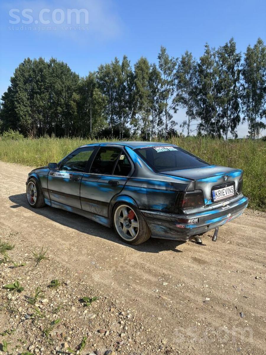 Blue BMW 318 1991 in Riga, with an engine capacity of 2.30 L and mileage of 216 thousand km for 5500 €, photo 4 on AUTOMOTO.COM.LV