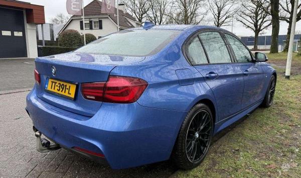 Blue BMW 318 2018 in Kaunas, with an engine capacity of 1.50 L and mileage of 145 thousand km for 9990 €, photo 4 on AUTOMOTO.COM.LV