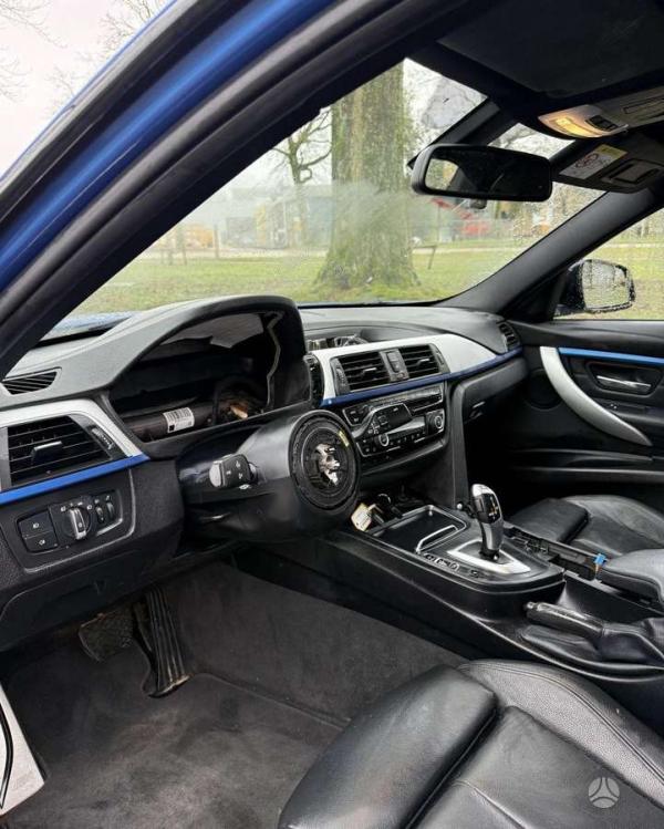 Blue BMW 318 2018 in Kaunas, with an engine capacity of 1.50 L and mileage of 145 thousand km for 9990 €, photo 10 on AUTOMOTO.COM.LV