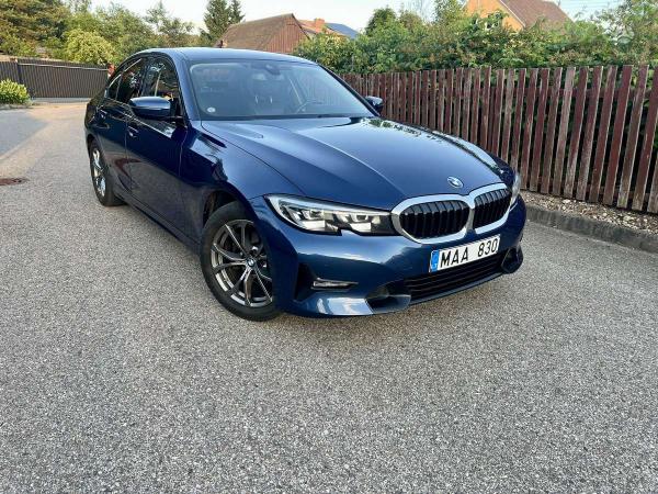 Blue BMW 318 2021 in Ignalina, with an engine capacity of 2.00 L and mileage of 80 thousand km for 21000 €, photo 3 on AUTOMOTO.COM.LV