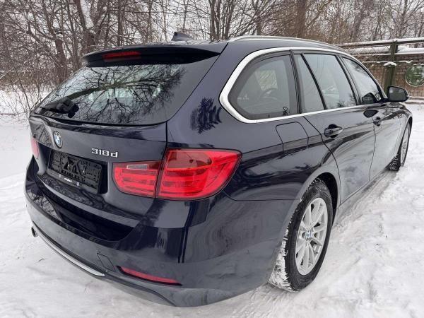 Blue BMW 318 2013 in Siauliai, with an engine capacity of 2.00 L and mileage of 233 thousand km for 6650 €, photo 9 on AUTOMOTO.COM.LV