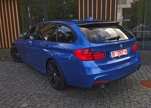 Blue BMW 318 2013 in Riga, with an engine capacity of 2.00 L and mileage of 253 thousand km for 12690 €, photo 9 on AUTOMOTO.COM.LV
