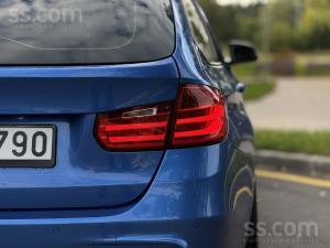 Blue BMW 318 2013 in Riga, with an engine capacity of 2.00 L and mileage of 280 thousand km for 9450 €, photo 12 on AUTOMOTO.COM.LV