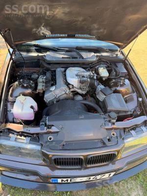 Brūns BMW 318 2000 Rīga, ar dzinēja tilpumu 1.80 L un nobraukumu 214 tūkst. km par 6000 €, foto 12 vietnē AUTOMOTO.COM.LV