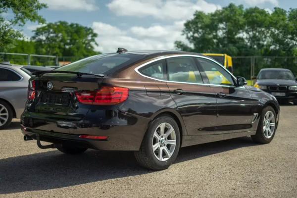 Brown BMW 318 2014 in Liepaja, with an engine capacity of 2.00 L and mileage of 174 thousand km for 12950 €, photo 4 on AUTOMOTO.COM.LV